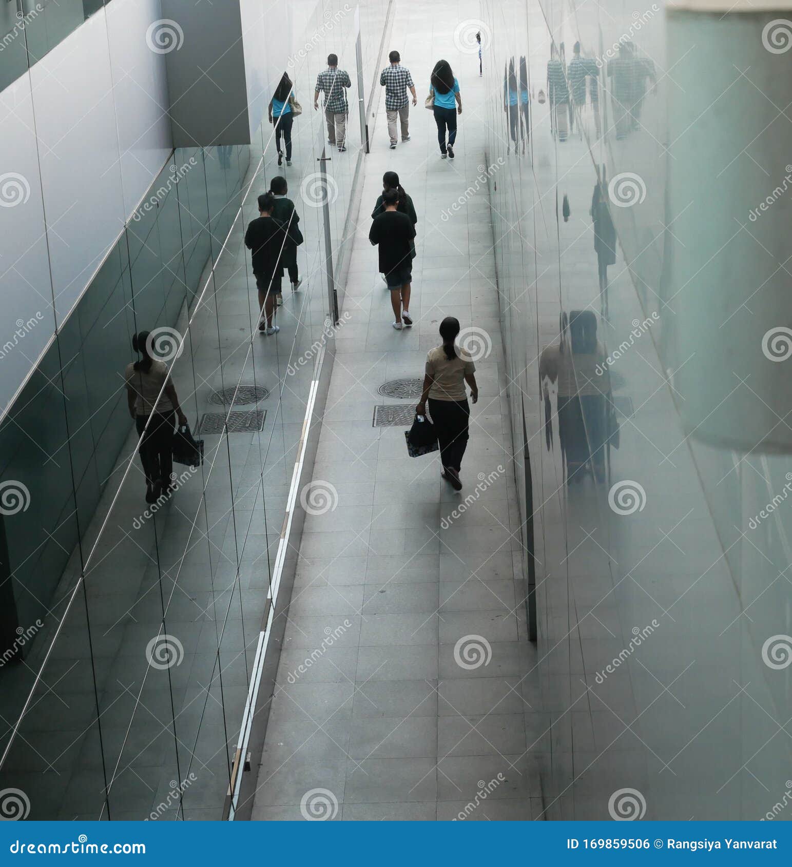 People walking on walkway stock photo. Image of busy - 169859506