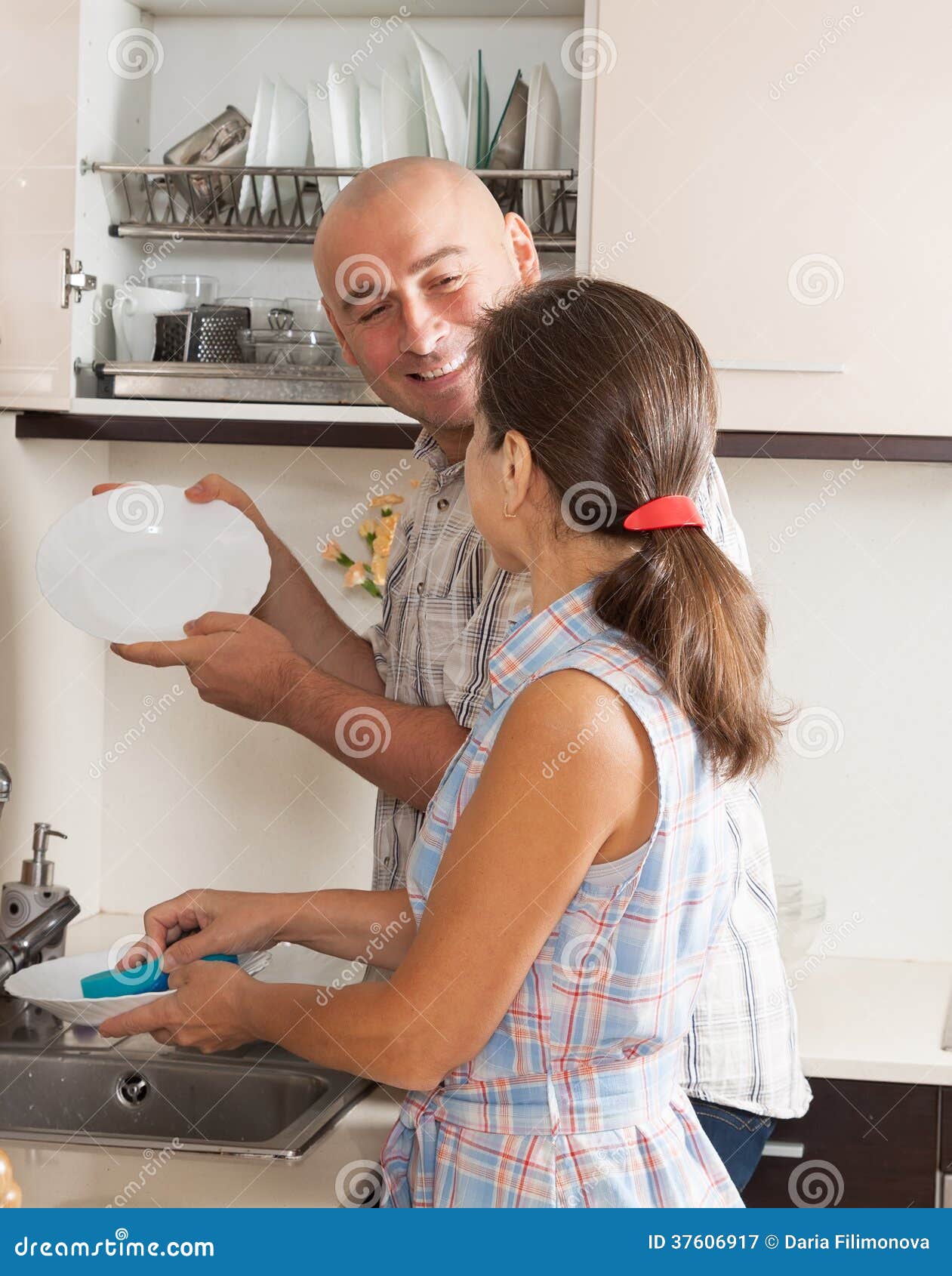People washing plates stock image. Image of lifestyle - 37606917