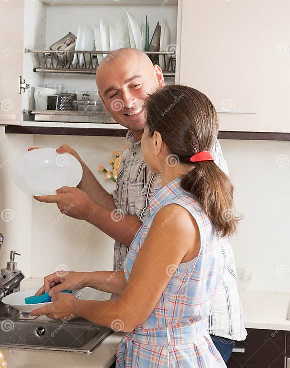 People washing plates stock image. Image of lifestyle - 37606917
