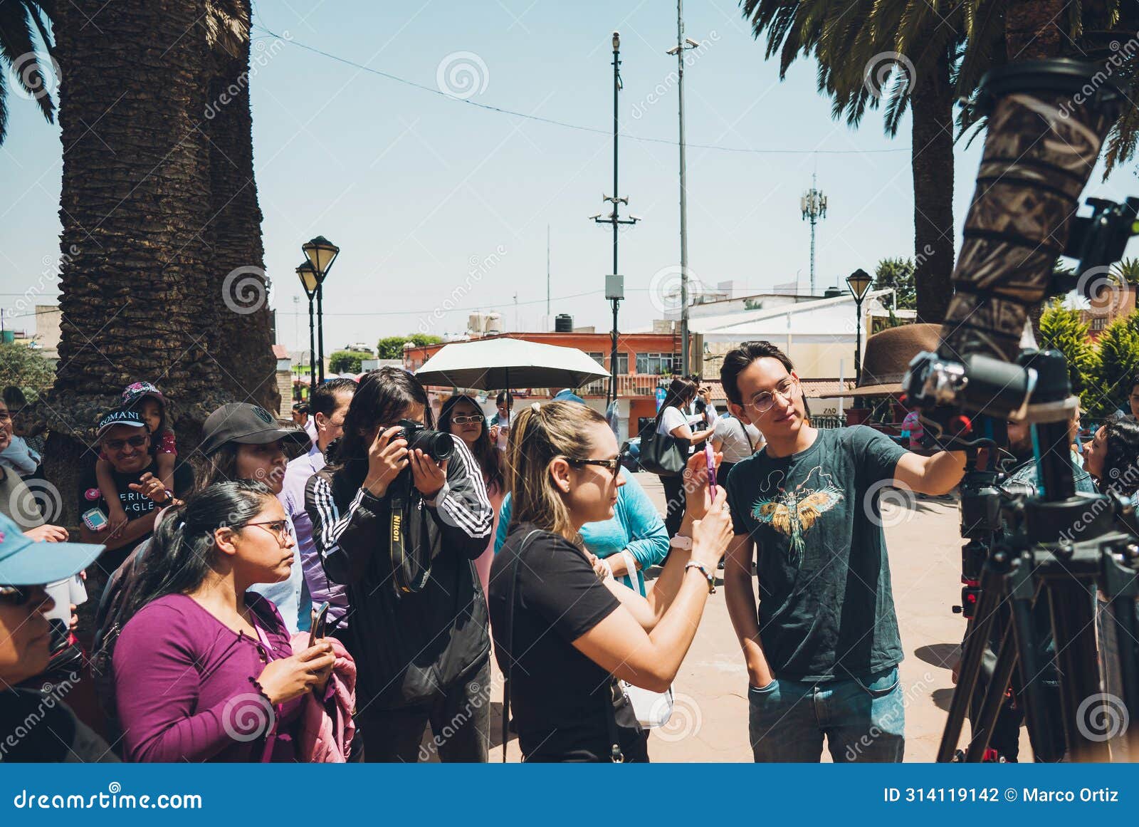 People Watching the Annular Solar Eclipse in Mexico with Cameras and ...