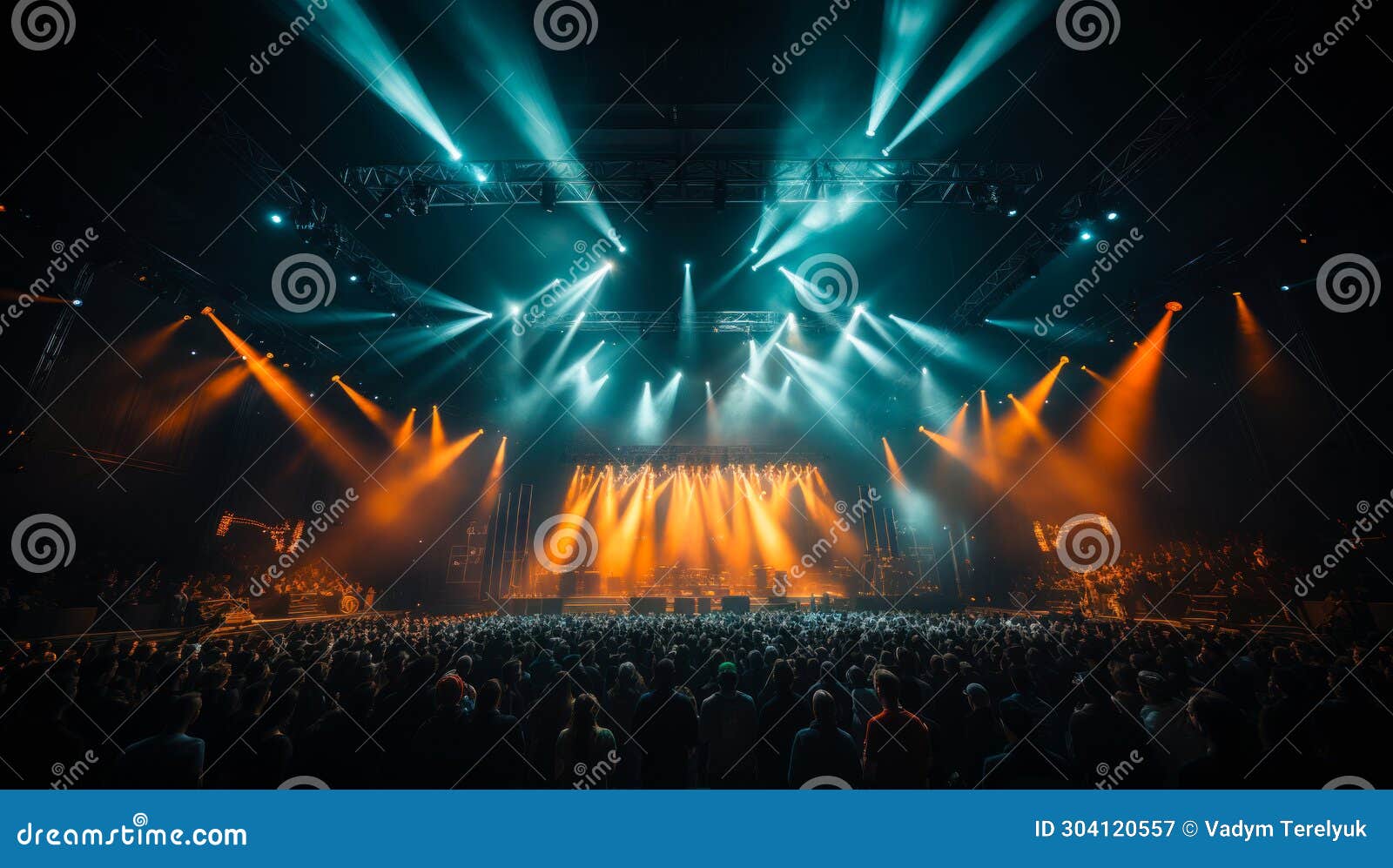 People Watching the Concert on the Stage. Audience Facing the Stage Lit ...