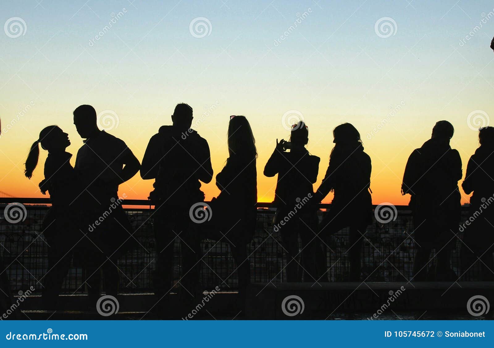 People Watching the Sunset in a Viewpoint of Lisbon in Autumn Editorial ...