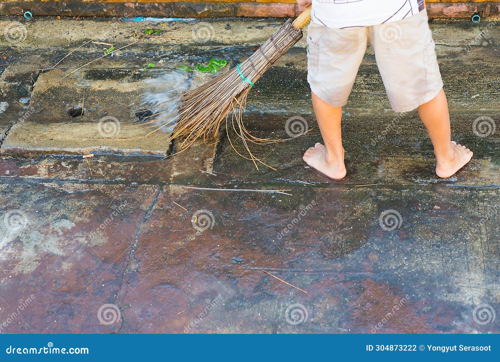People Who are Using a Broom To Sweep the Floor Clean Stock Photo ...