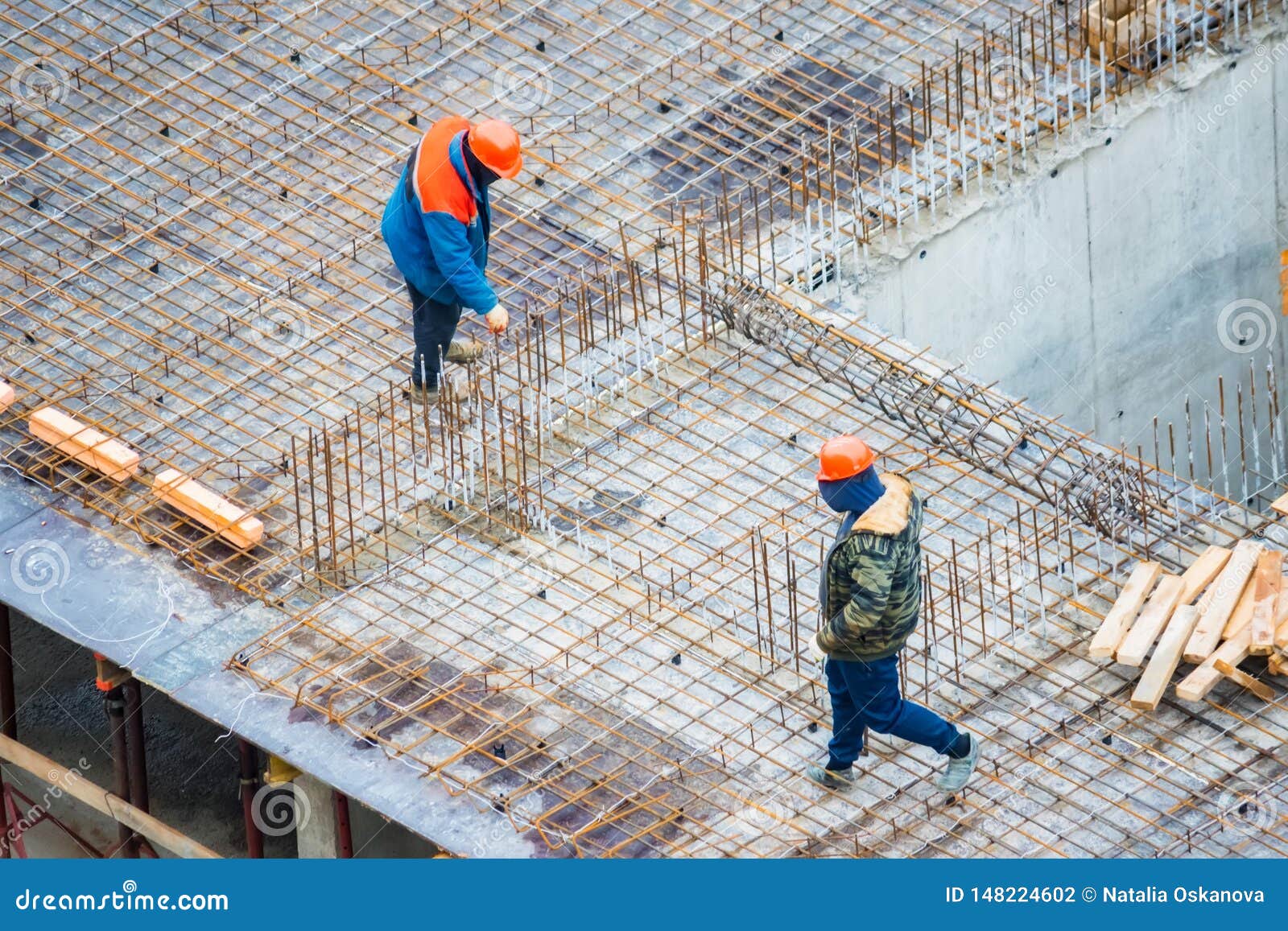 People Work with Reinforcement Carcass Made of Fitness at Construction ...