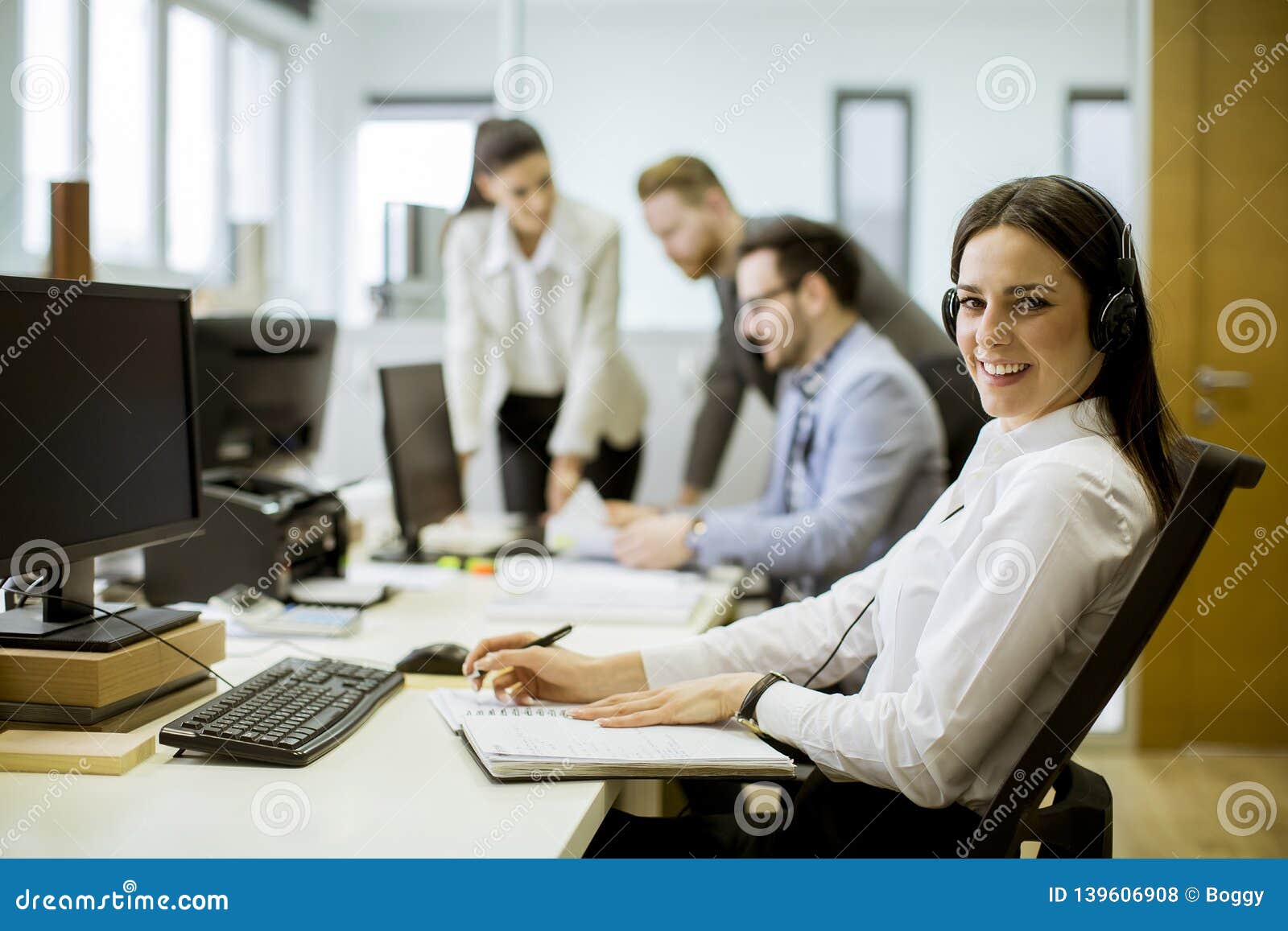 People Working in a Busy Office Stock Photo - Image of communication ...