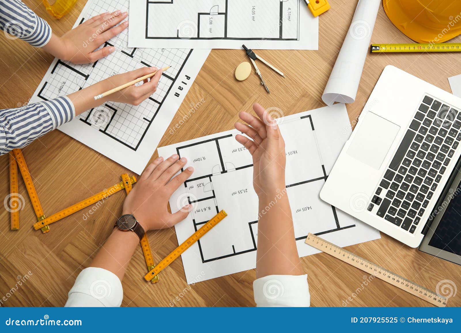 People Working with Construction Drawings and Tools at Wooden Table ...