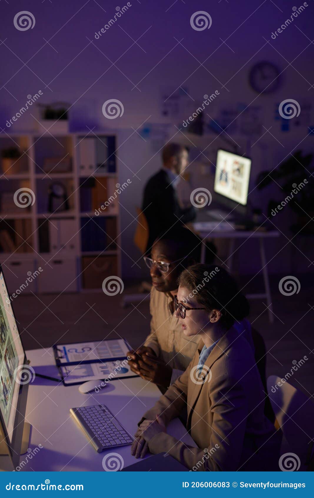 People Working in Darkness stock image. Image of table - 206006083