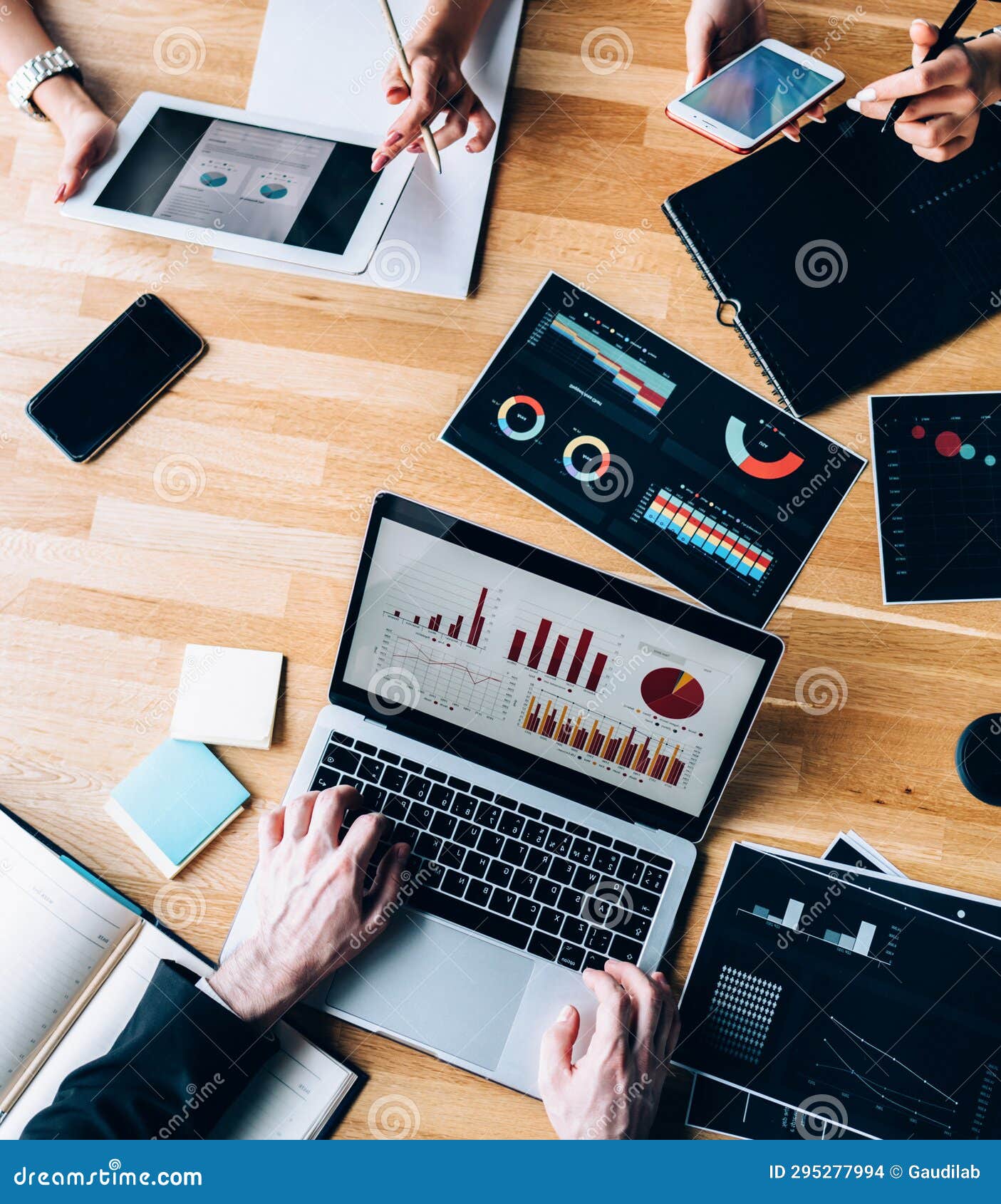 People Working with Electronic Devices and Papers Stock Photo - Image ...