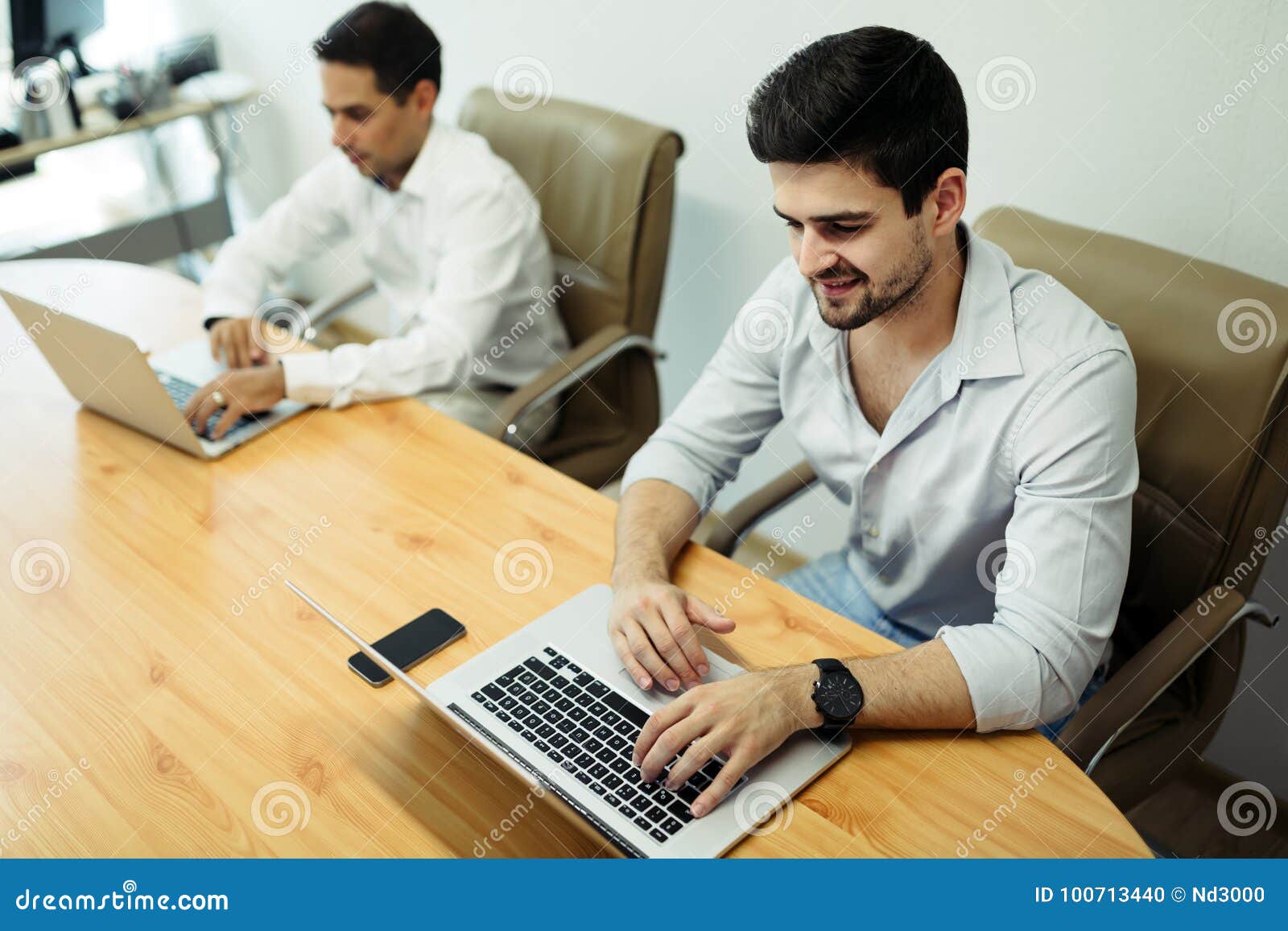 People Working on Laptops in Office Stock Photo - Image of internet ...