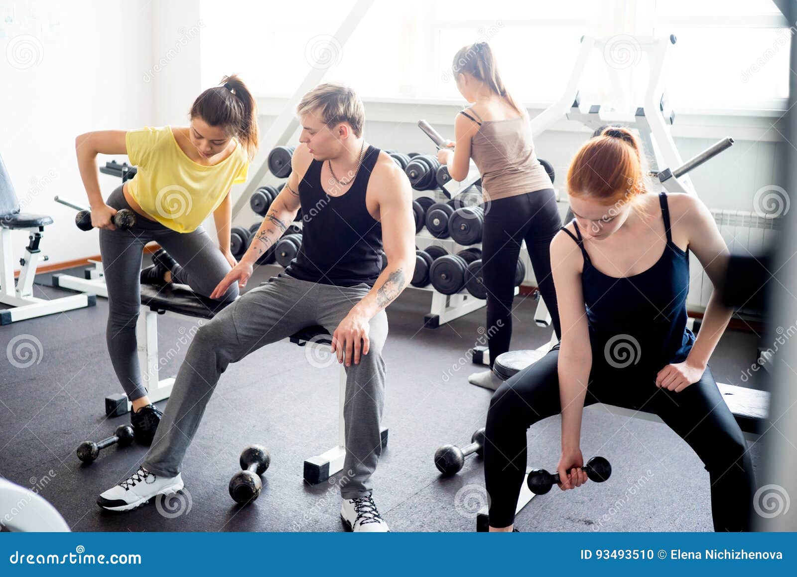 People working out at gym stock photo. Image of person - 93493510