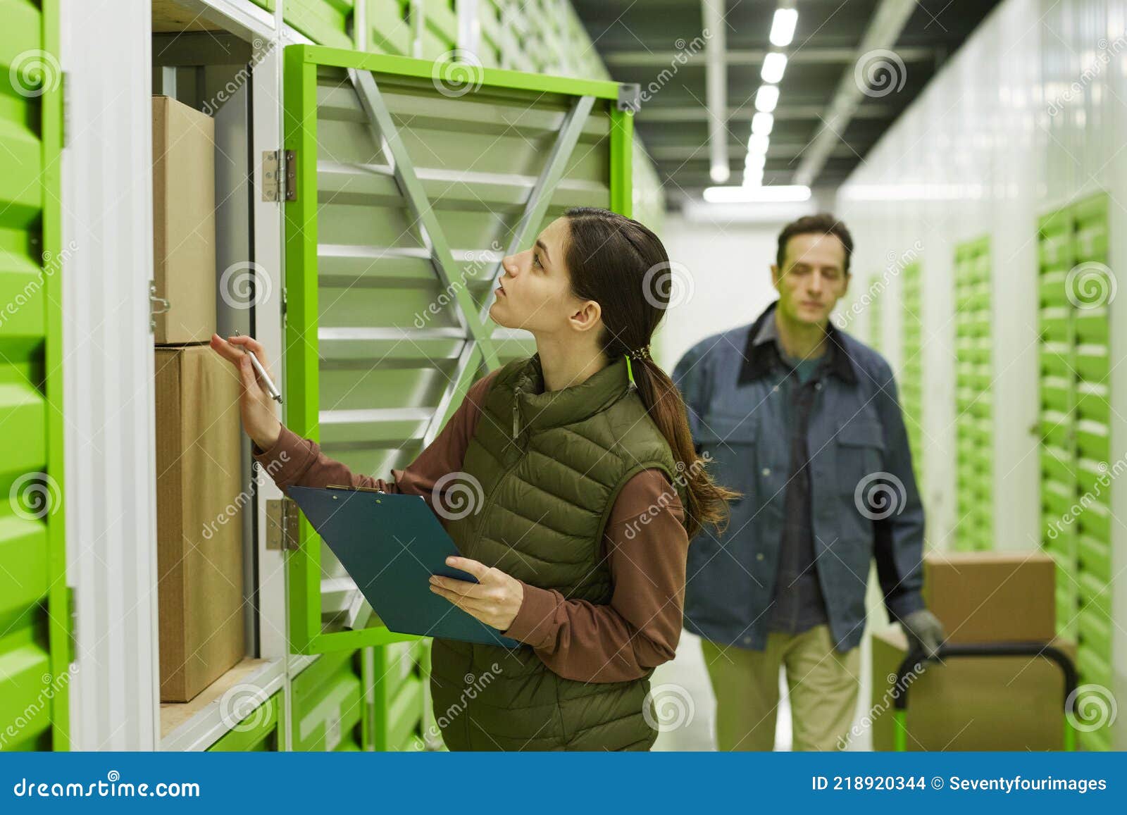 People Working with Parcels in Storage Stock Photo - Image of ...