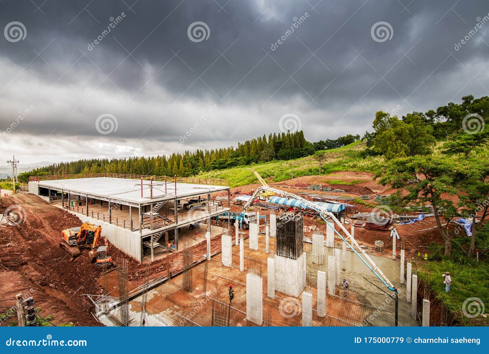 People Working at Site Construction Under Rain Cloud Stock Image ...