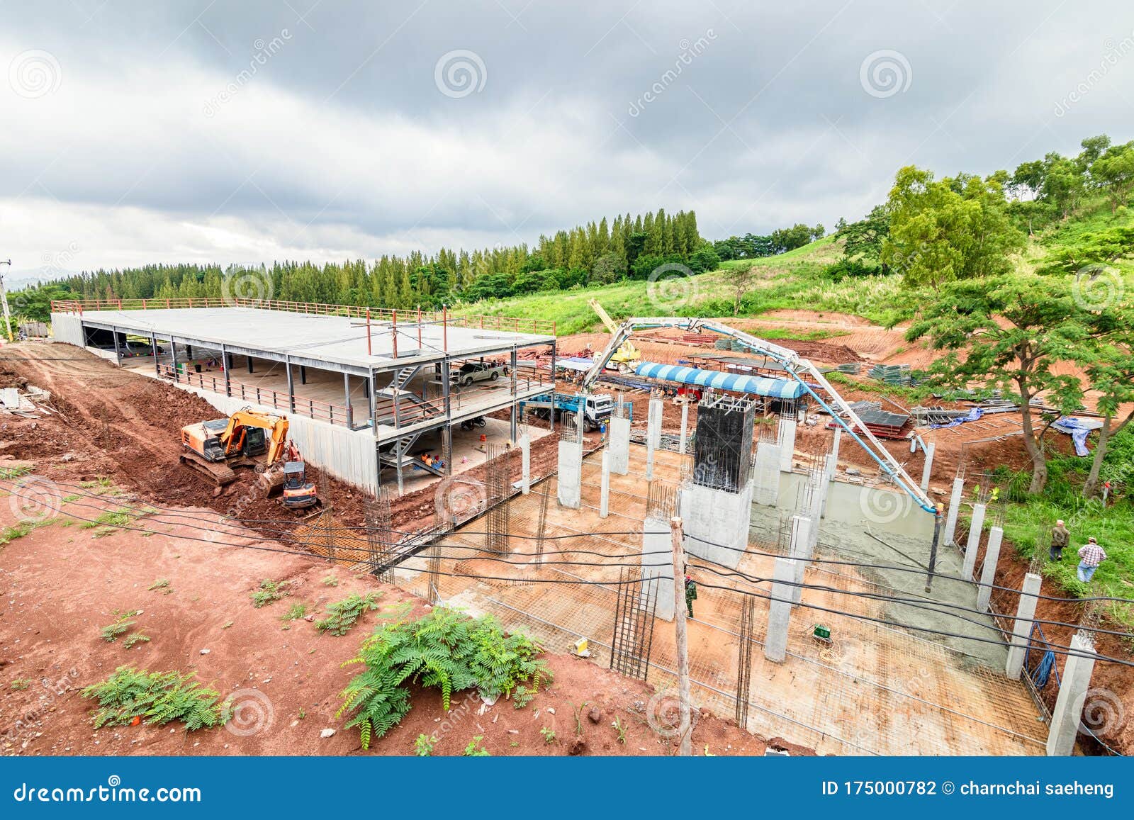 People Working at Site Construction Under Rain Cloud Stock Photo ...