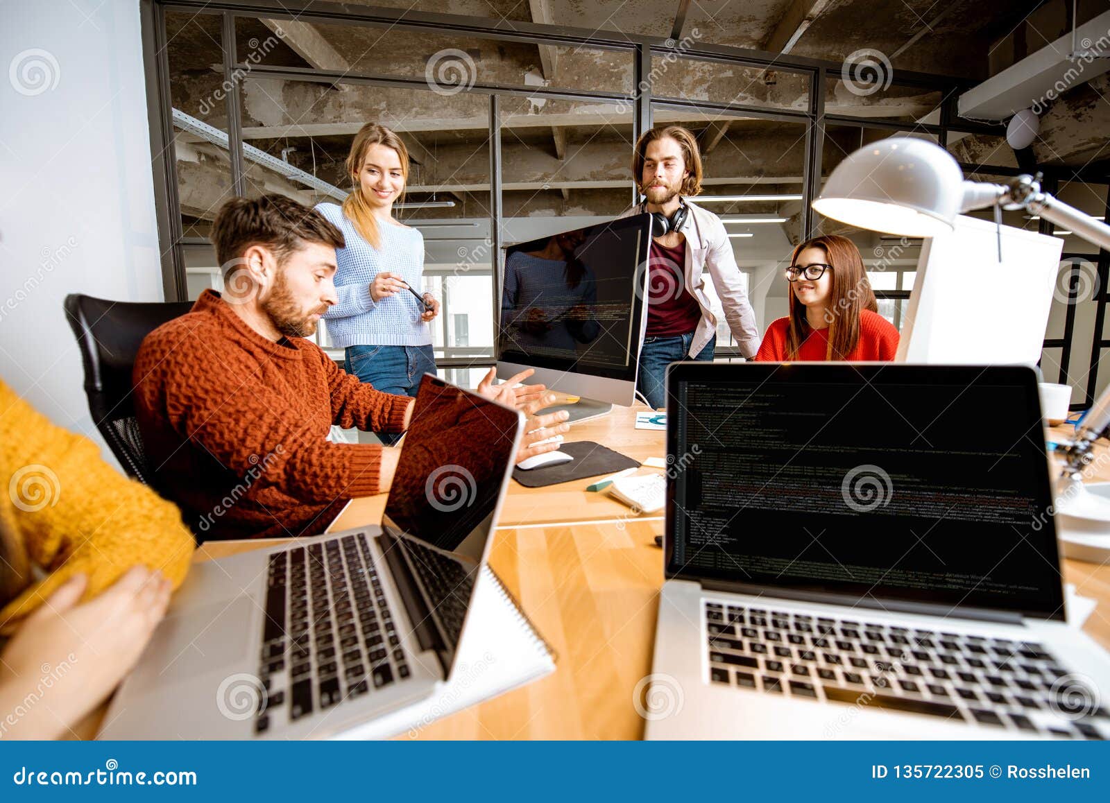 People Working Together on the Computers in the Office Stock Image ...