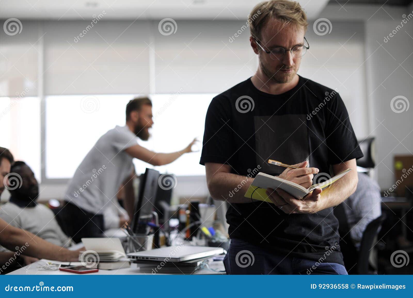 People Working Writing Note on Notebook in Office Stock Photo - Image ...