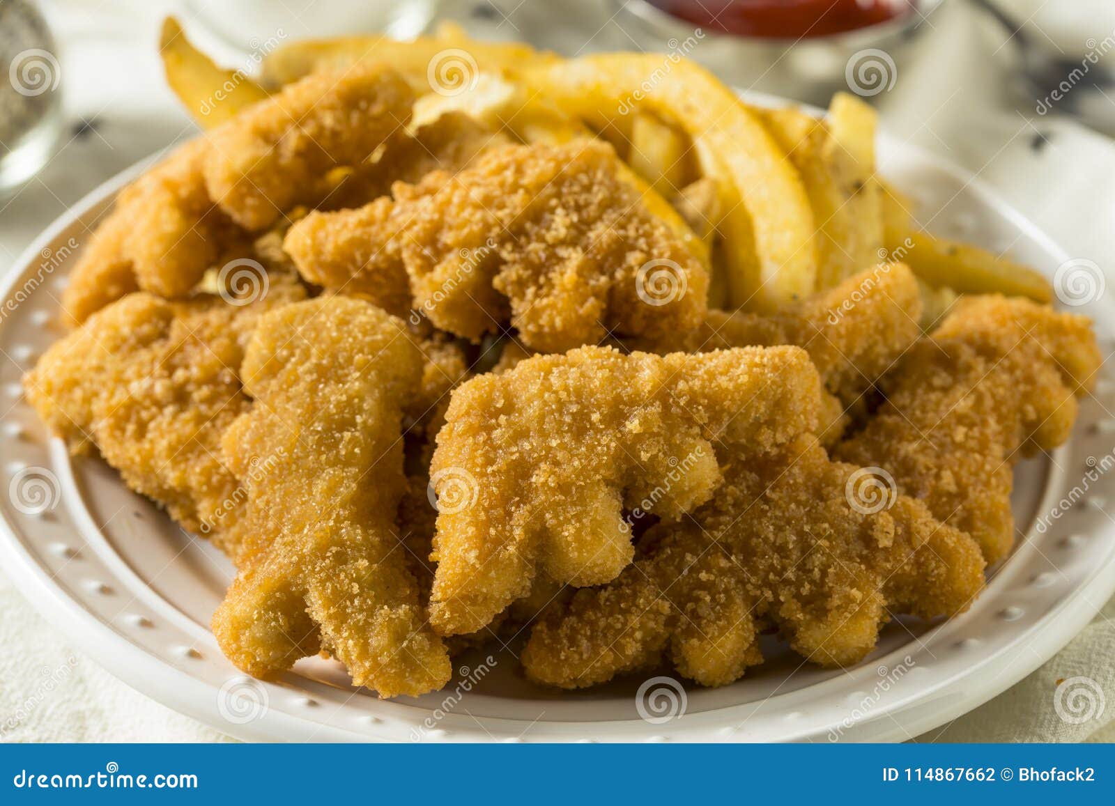 Pepitas De Pollo Formadas Dinosaurio De Los Niños Foto de archivo ...