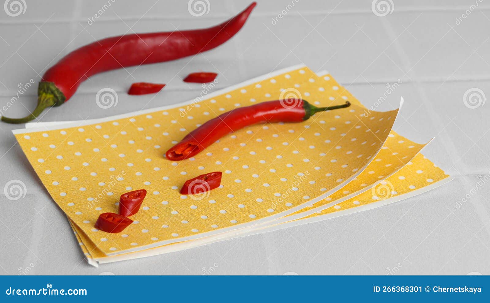 Pepper Plaster and Chili on White Tiled Table, Closeup Stock Image ...