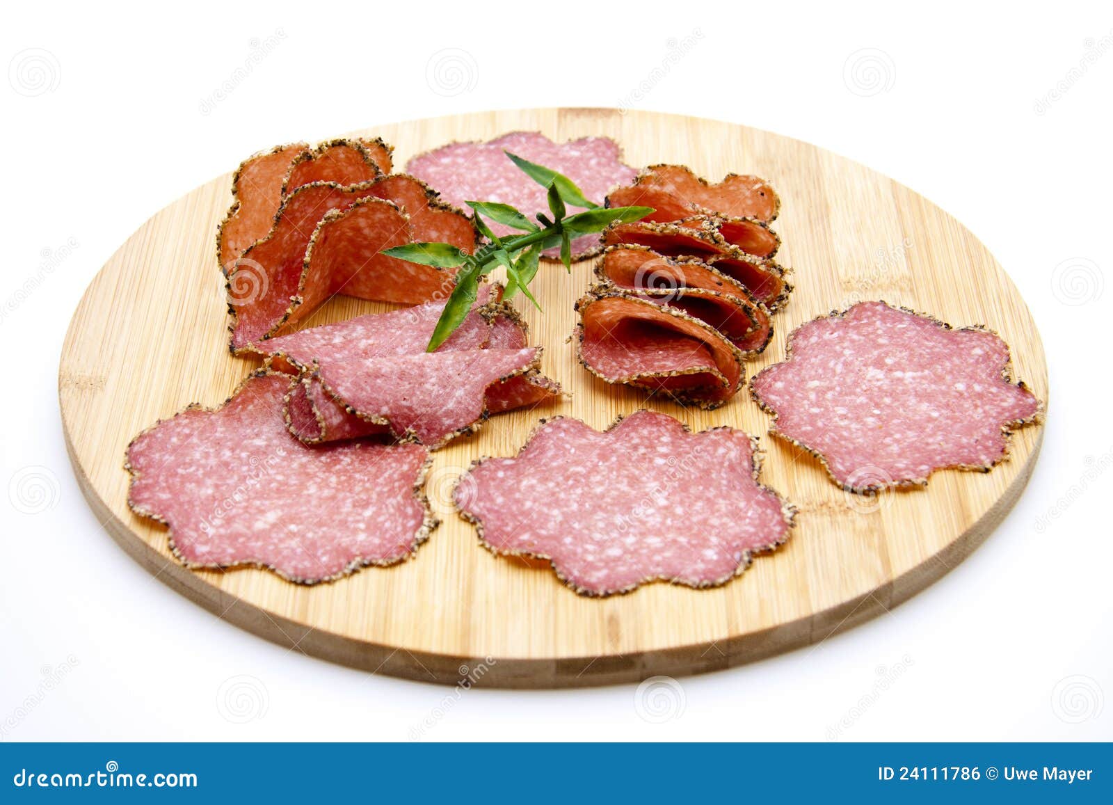 Pepper Salami on Wooden Plate Stock Photo - Image of wooden, salamis ...