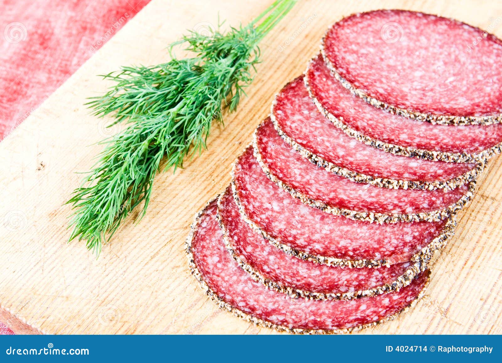 Peppered salami with dill stock photo. Image of cured - 4024714