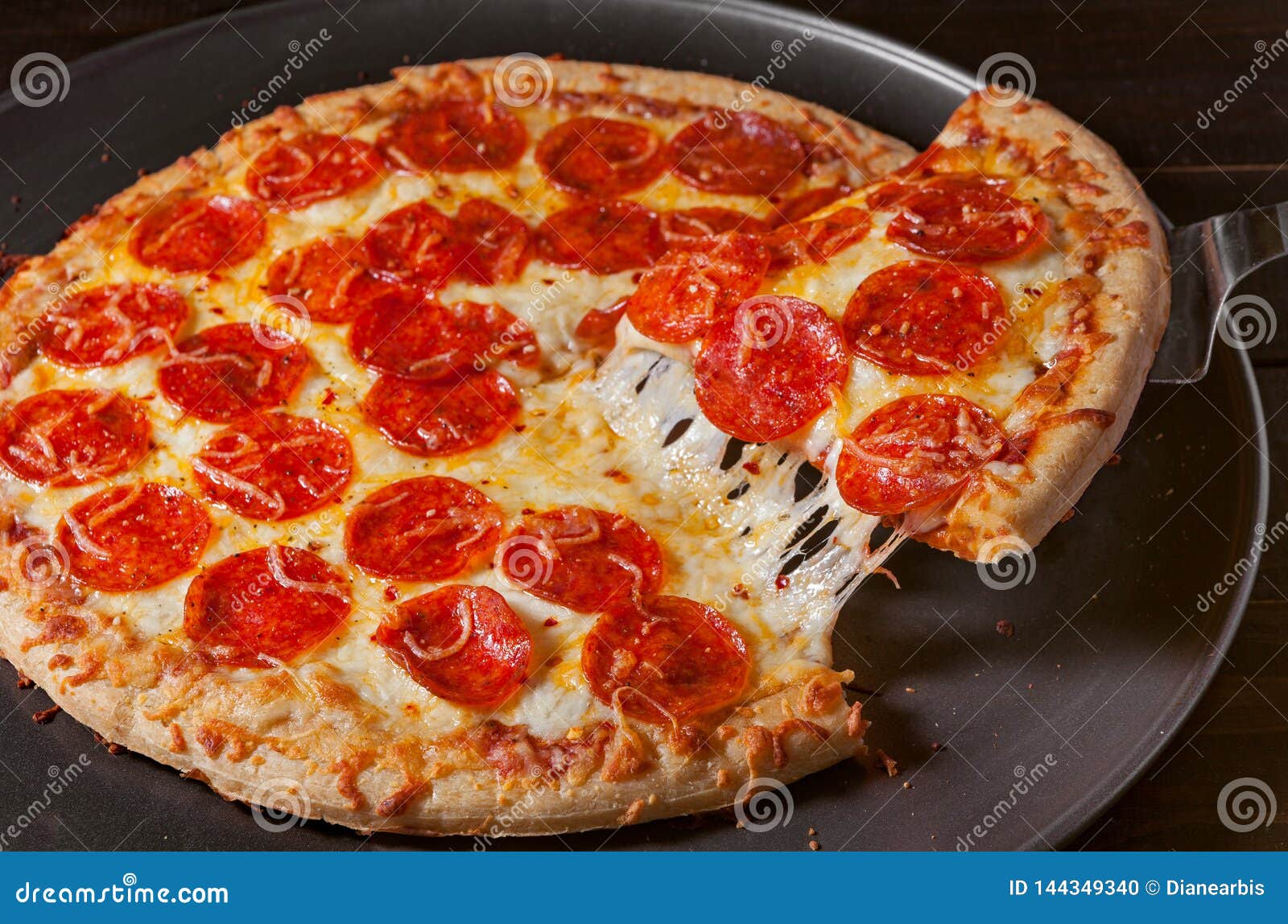 Pepperoni Pizza with Cheese Pull Stock Photo - Image of sauce, crust ...