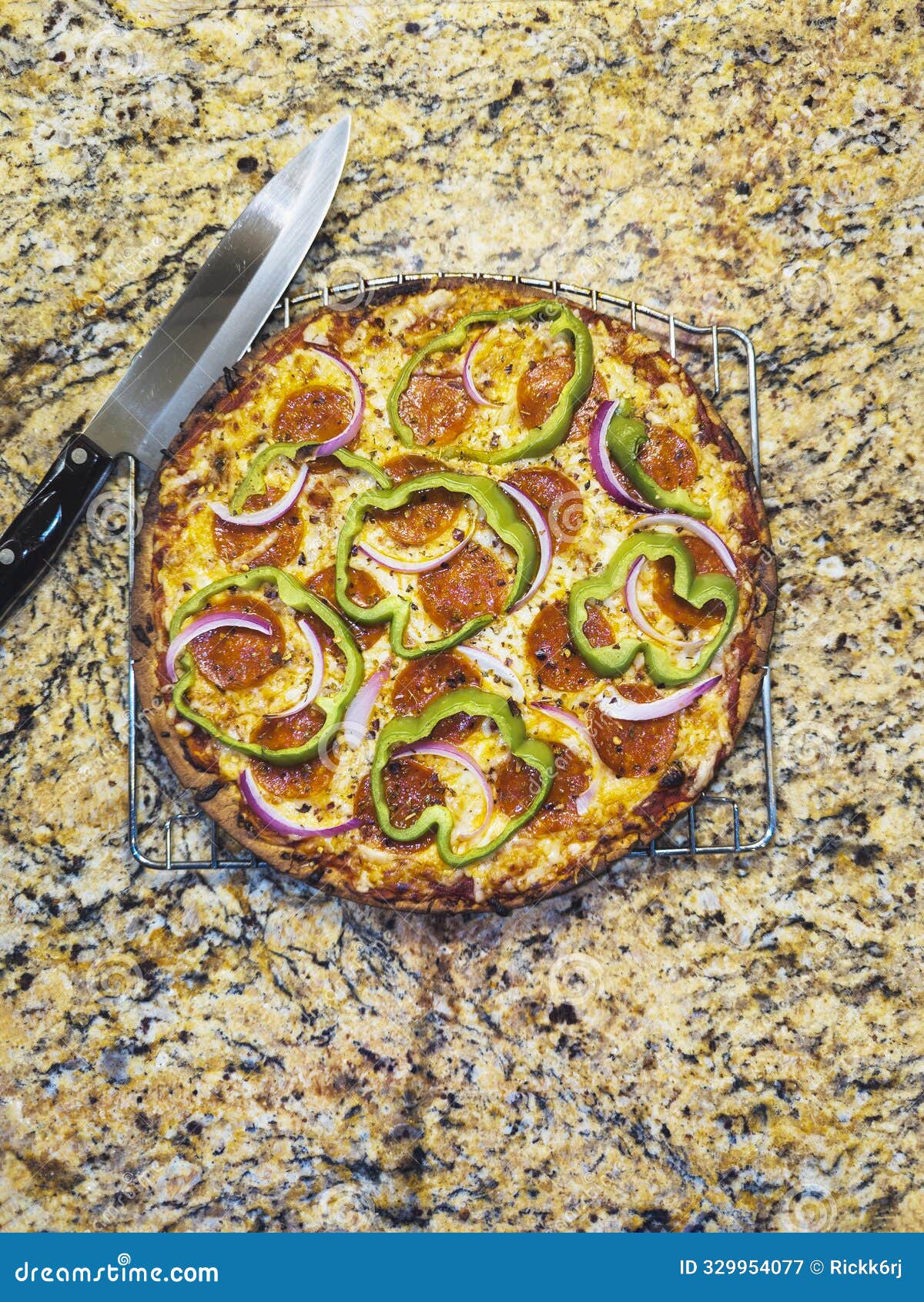 Pepperoni Pizza on Cooling Rack on Marble Countertop Stock Image ...