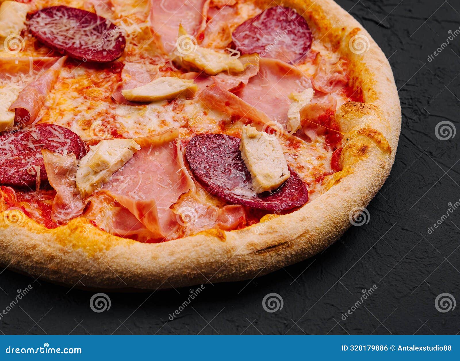 Pepperoni Pizza with Mozzarella Cheese, Salami, Ham Stock Photo - Image ...