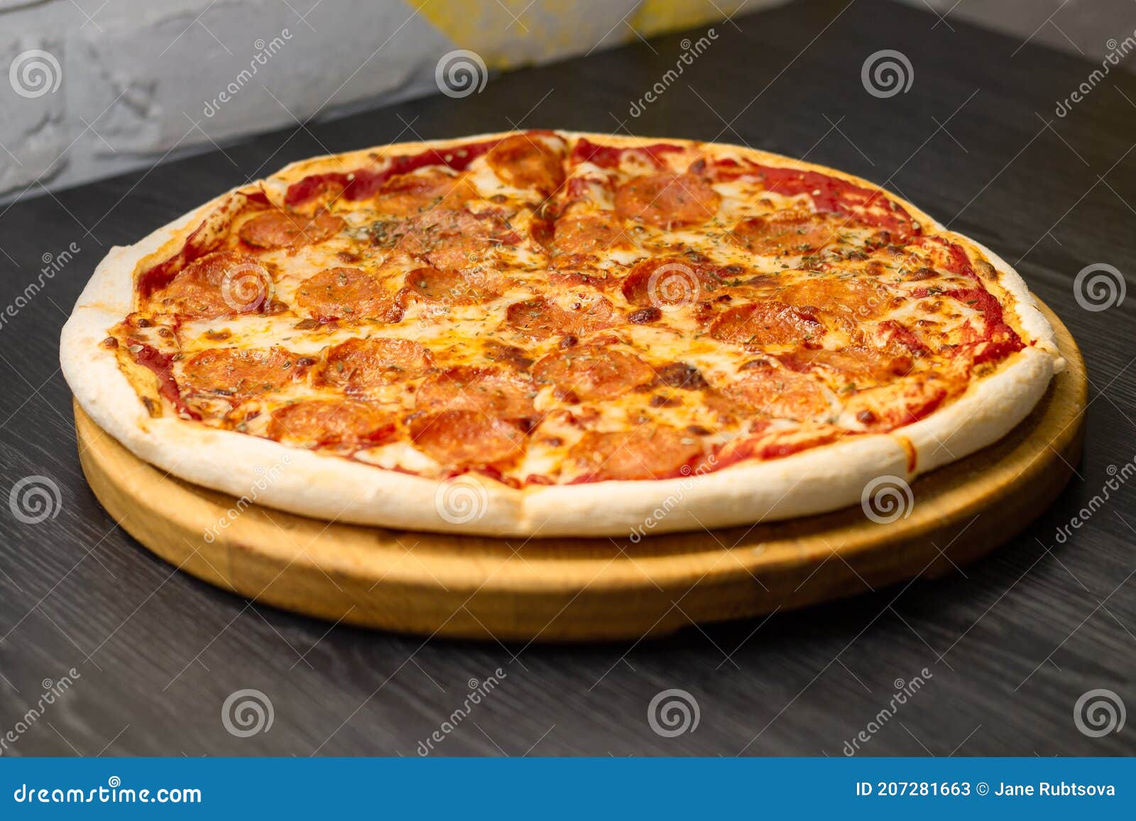 Pepperoni Pizza on Round Tray on Wooden Table Stock Image - Image of ...