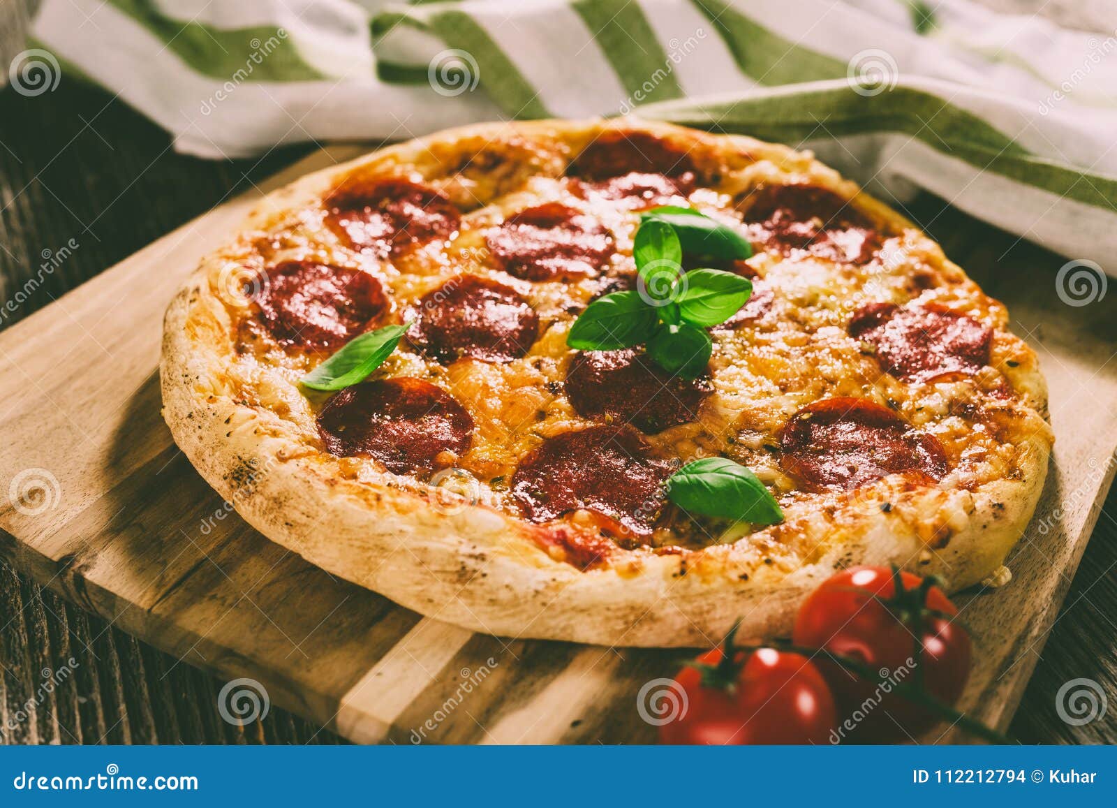 Pepperoni pizza stock photo. Image of pepperoni, basil - 112212794