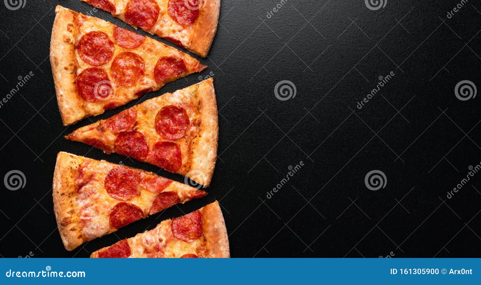Pepperoni Pizza Slice on Black Slate Background Stock Photo - Image of ...