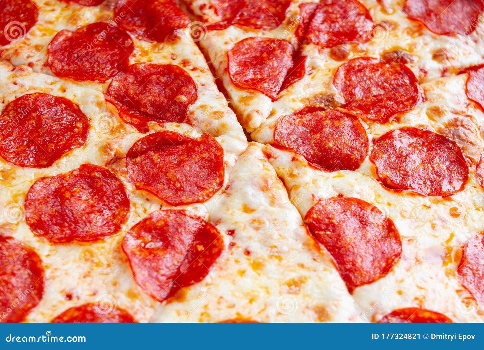 Pepperoni Pizza Sliced into Pieces, Sausage Round on Pizza Stock Image ...