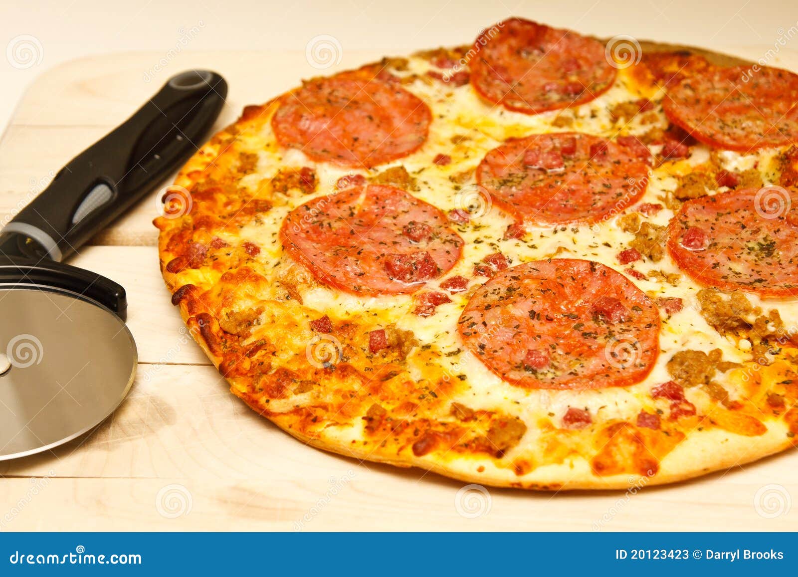 Pepperoni and Sausage Pizza on Board with Cutter Stock Image - Image of ...