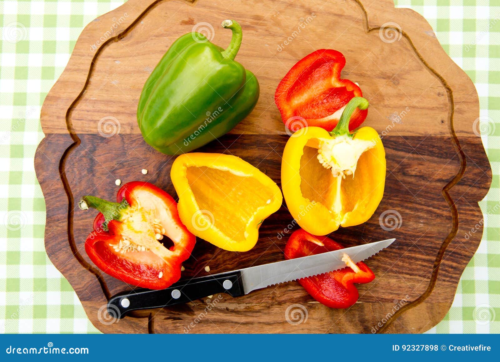 Peppers - Capsicum Cut on Wooden Board Stock Photo - Image of cutting ...