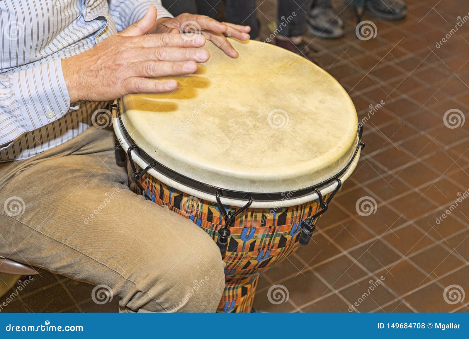 The Percussionist Uses the Bongo To Rhythm the Song Stock Photo - Image ...