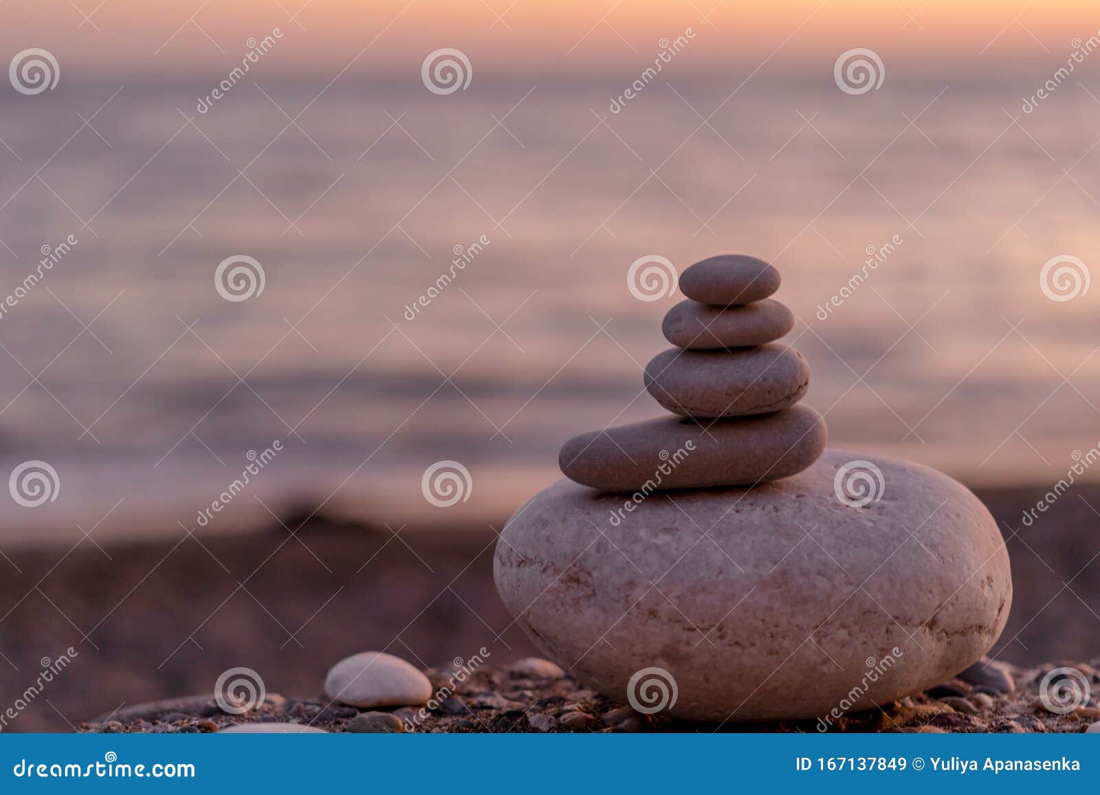 Perfect Balance of Stack of Pebbles at Seaside Towards Sunset. Stock ...