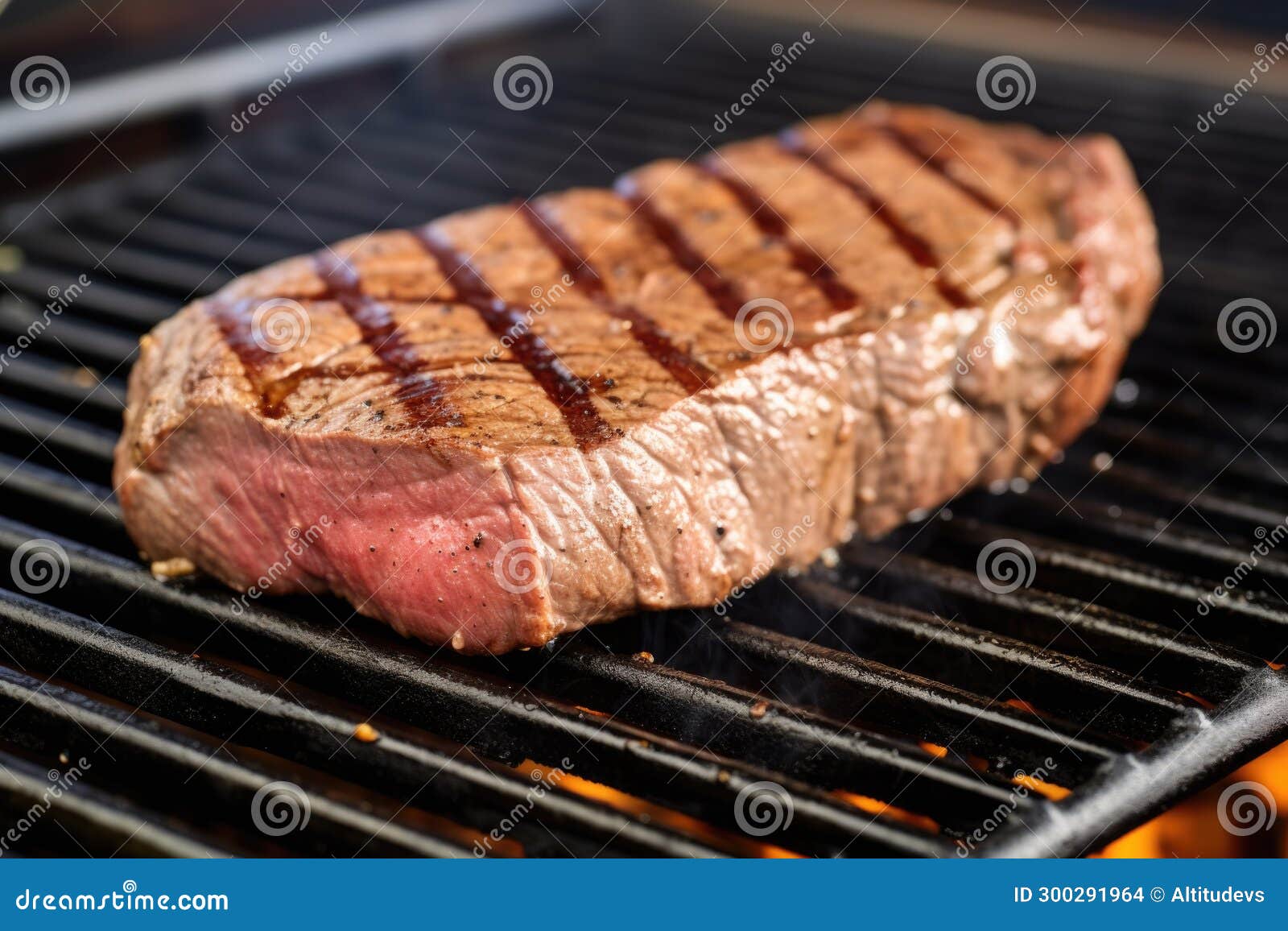 Perfect Grill Marks on Steak Checked for Doneness Stock Photo - Image ...