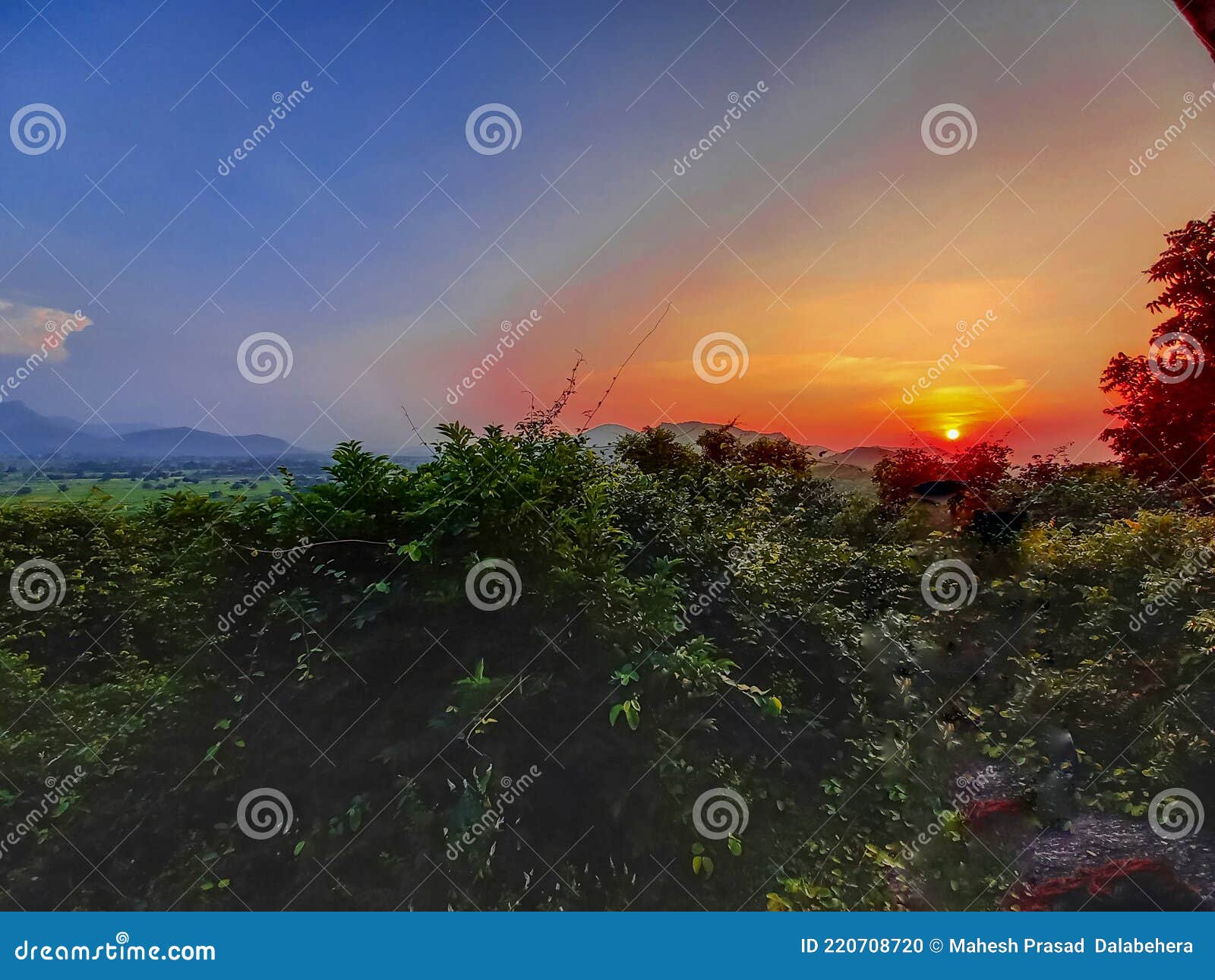 A Perfect Reddish Sunset View with a Beautiful Scenery. Stock Photo ...