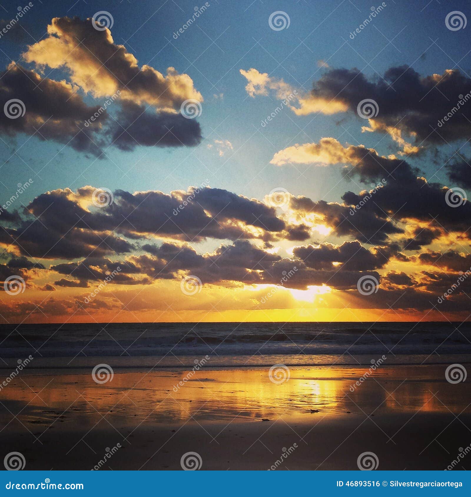 Perfect sunset at beach stock photo. Image of sunset - 46893516