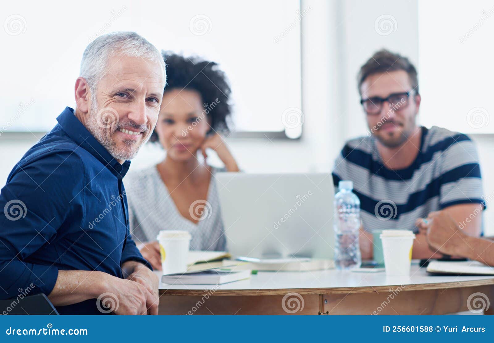 The Perfect Team. Portrait of a Group of Designers at Work in an Office ...