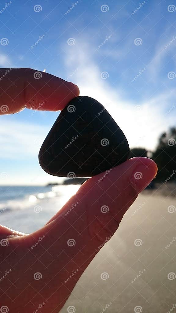 Perfect Triangular Rock stock image. Image of nerja, triangular - 89757391