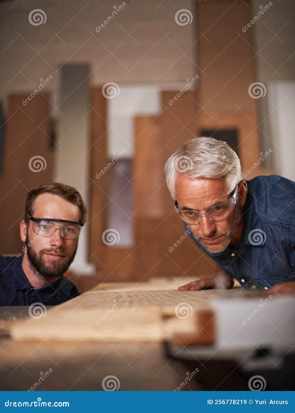 Perfecting Their Proportions. a Father and Son Working Together in a ...