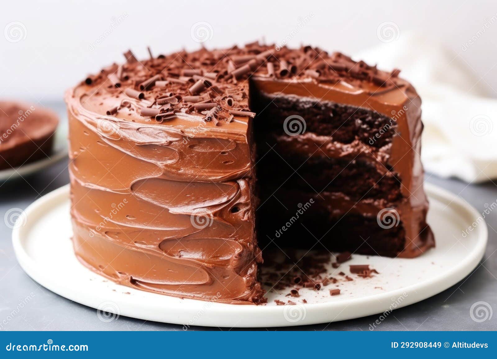 A Perfectly Frosted Chocolate Cake on a White Plate Stock Image - Image ...