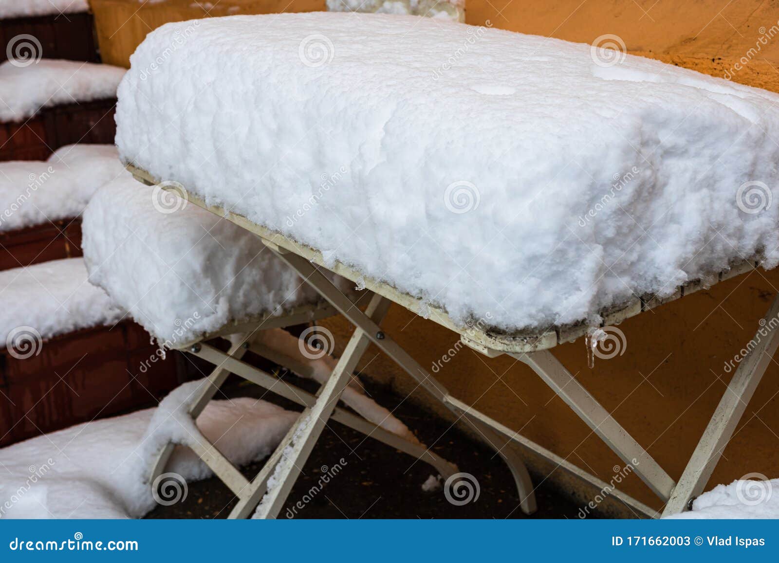 Perfectly Shaped Snow on Table and Chairs, Covered with Snow Stock ...