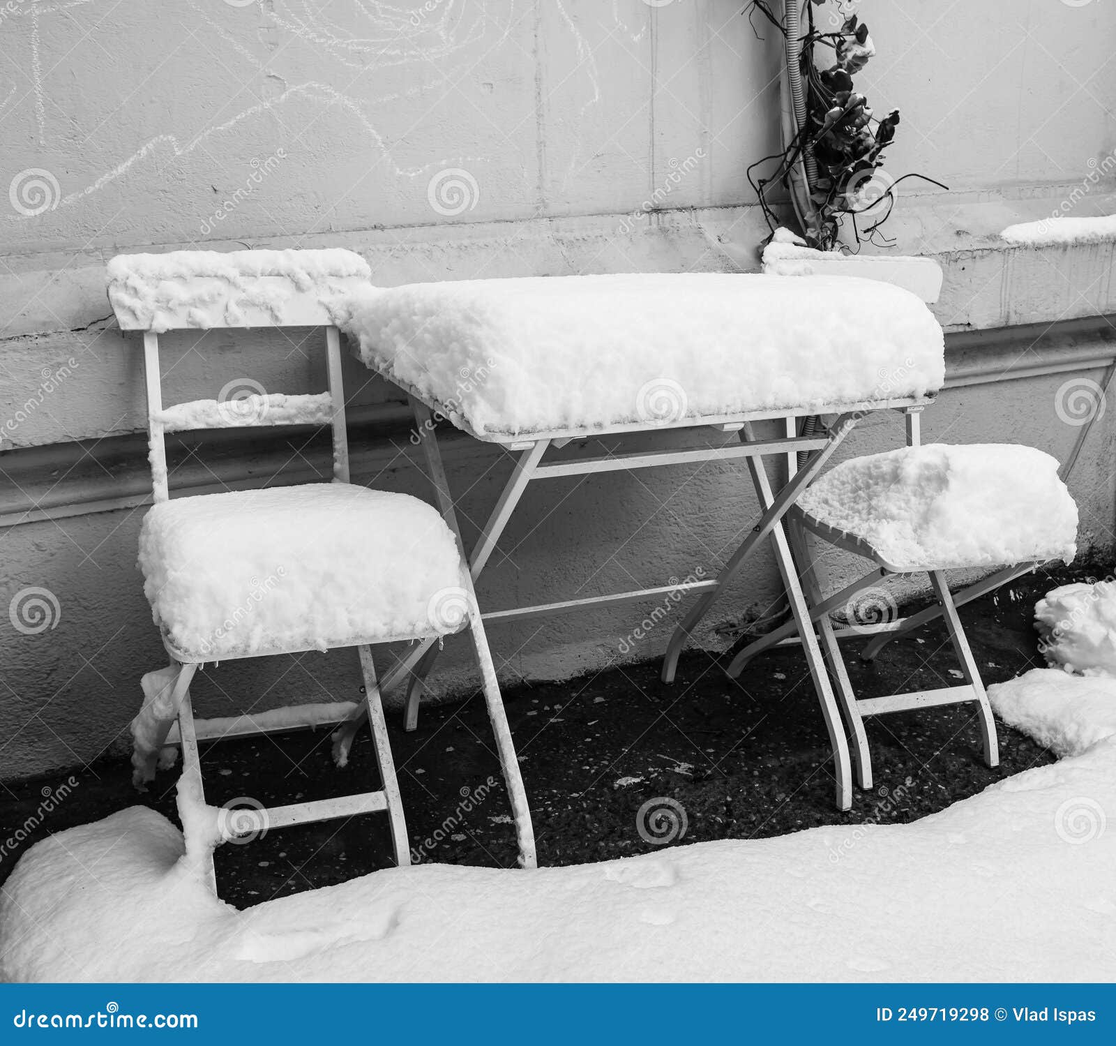 Perfectly Shaped Snow on Table and Chairs, Covered with Snow Stock ...