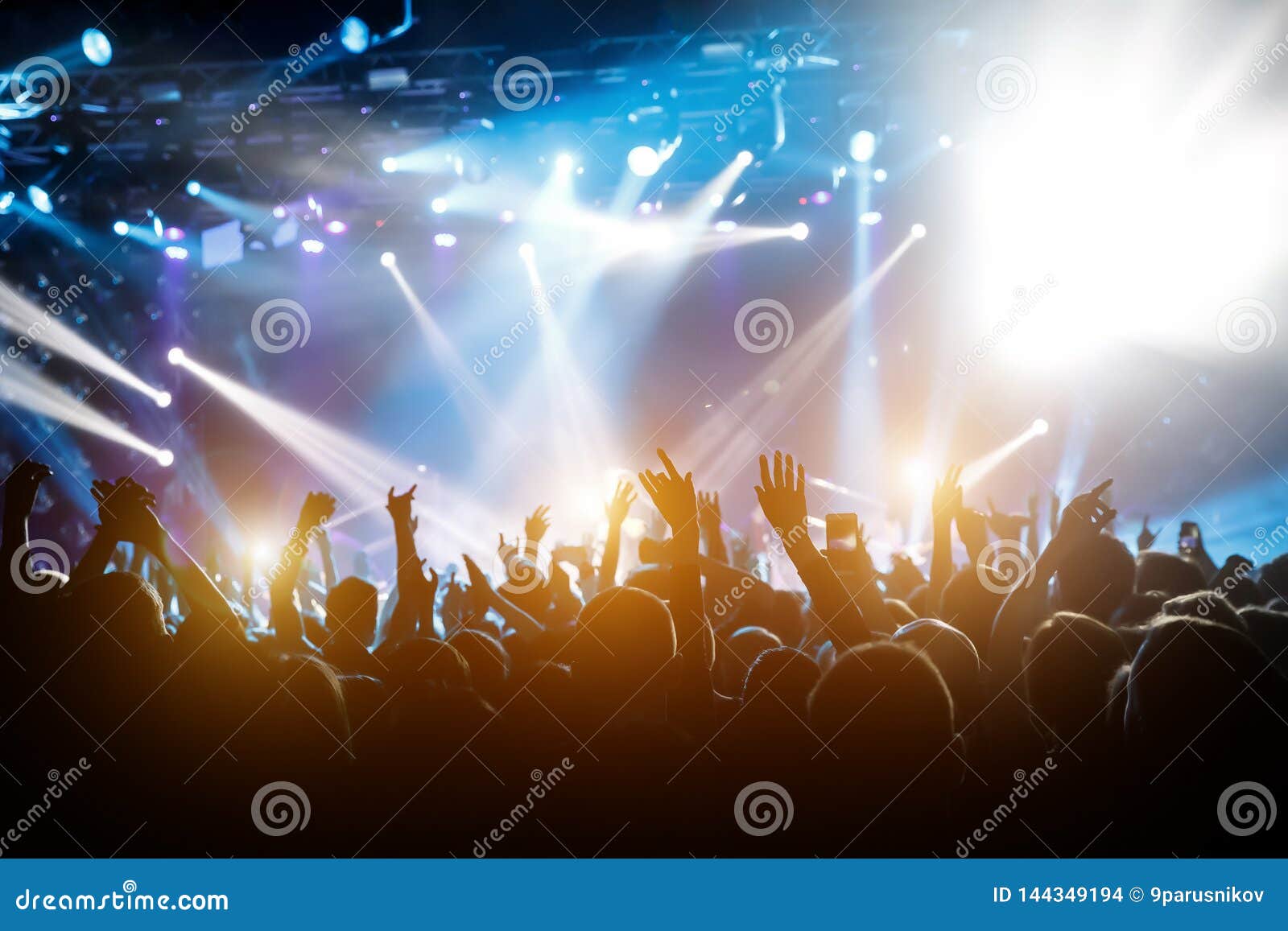 Performace of a Popular Group. Crowd is Dancing and Having Fun. Bright ...