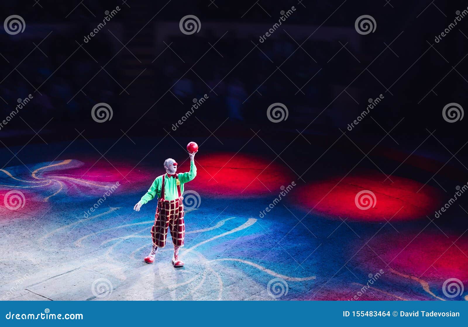 Performance of a Clown with a Ball at the Circus. Stock Photo - Image ...