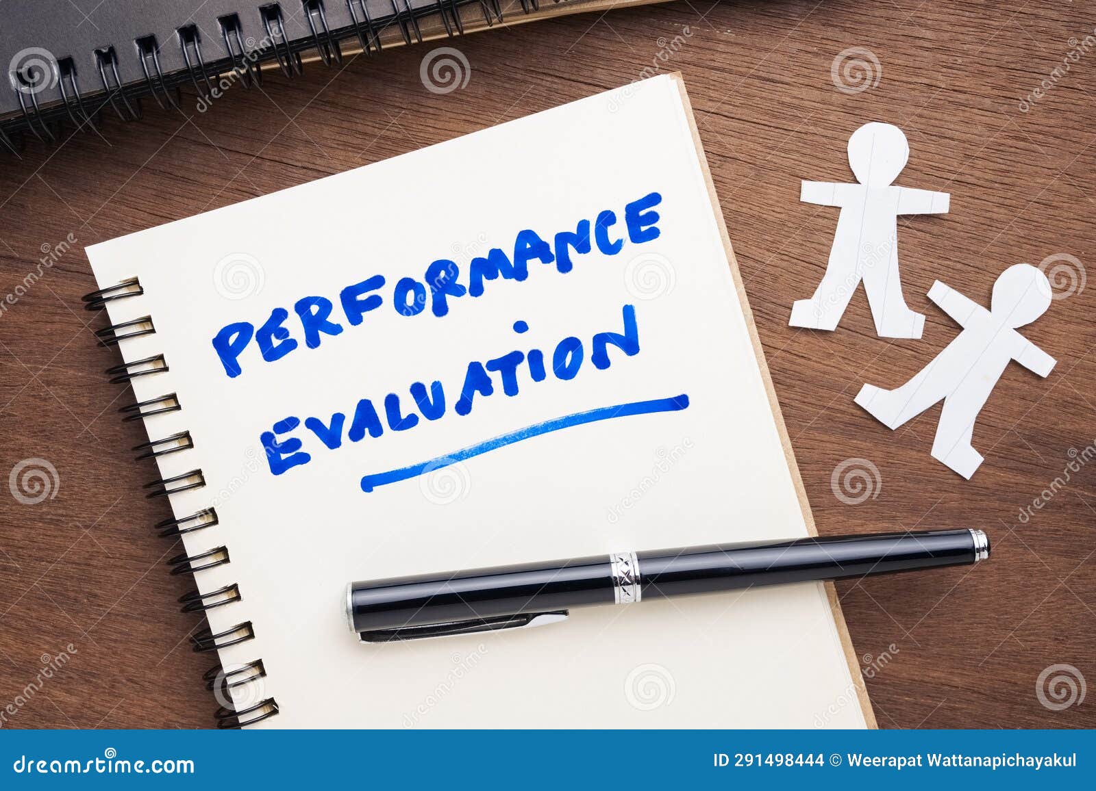 Performance Evaluation with Paper Dolls Stock Photo - Image of ...