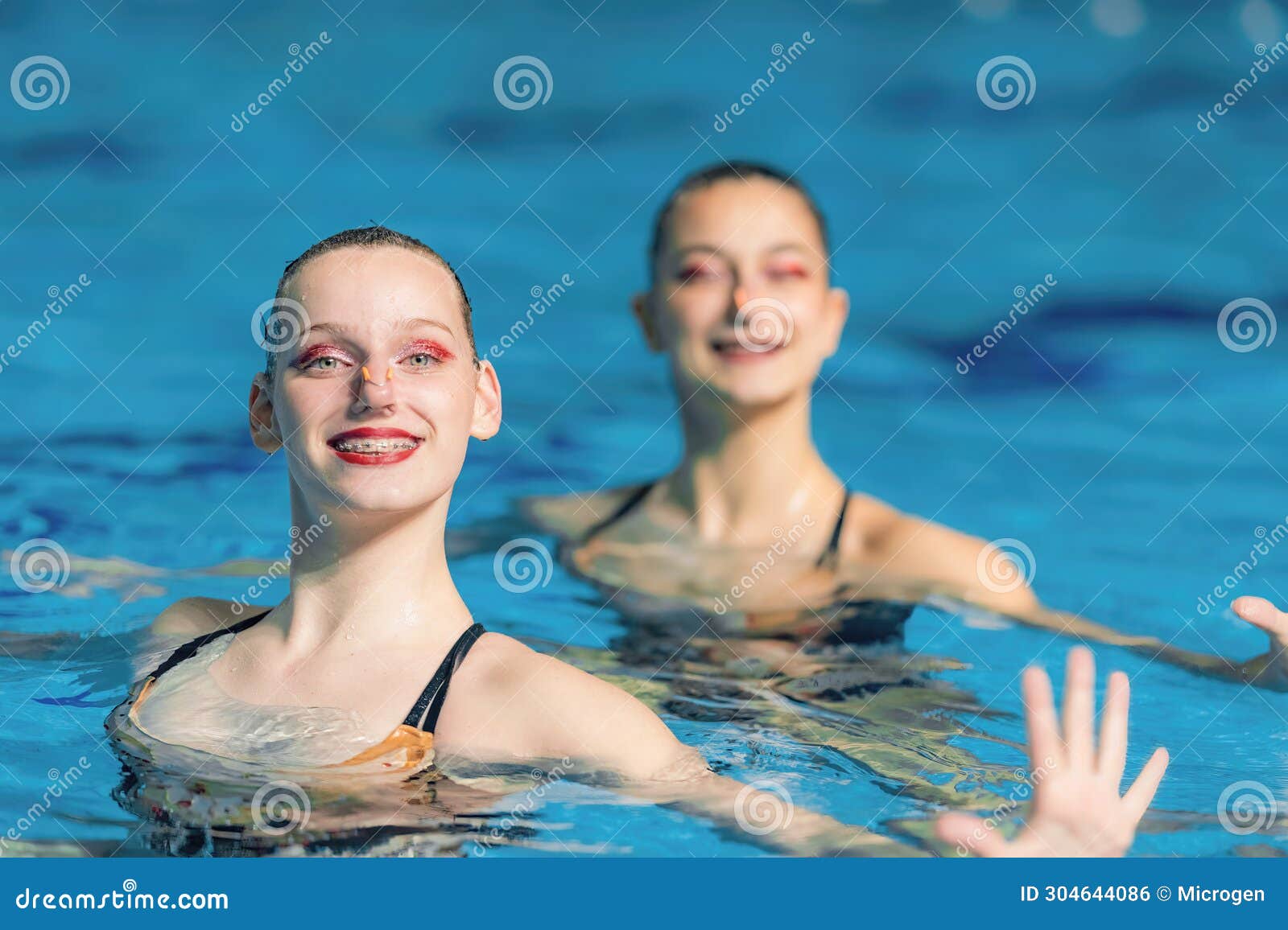 Performance of a Female Synchronized Swimming Duo, Their Fluid ...