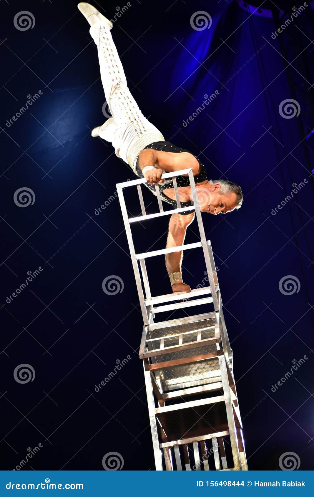 Circus Performer Balancing Upside Down on Chairs Editorial Stock Image ...