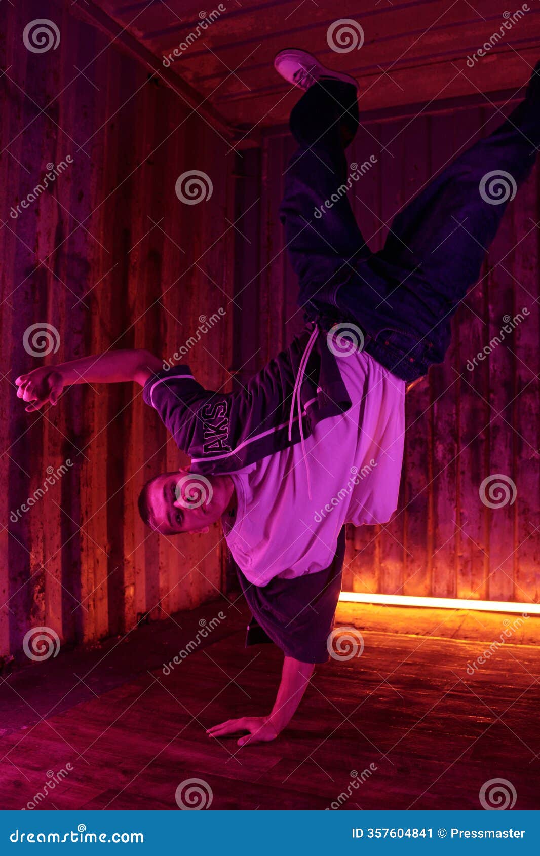Performing Breakdance Move in Industrial Setting Stock Image - Image of ...