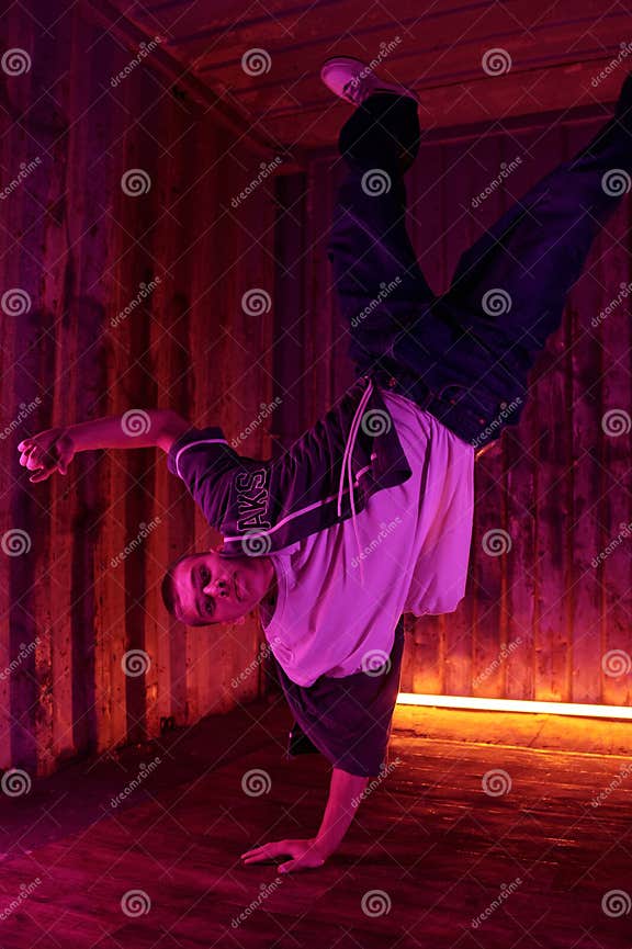 Performing Breakdance Move in Industrial Setting Stock Image - Image of street, strength: 357604841